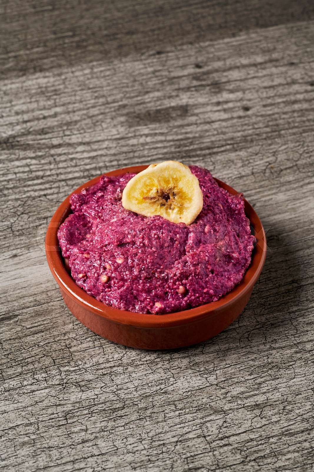 acai paste in a brown earthenware plate | Stock image | Colourbox