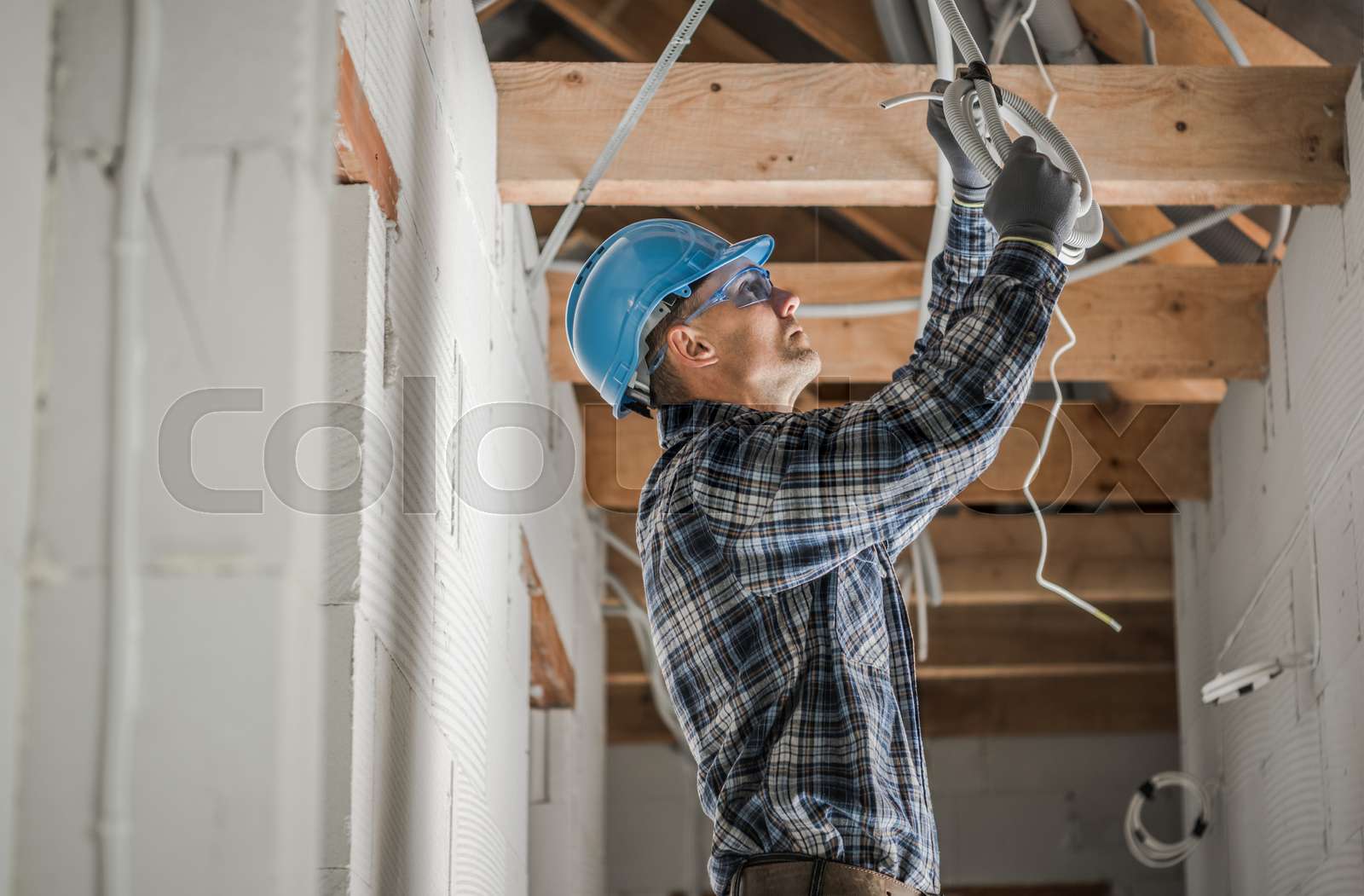 Professional Electrician Installing Ceiling Light Point | Stock image ...