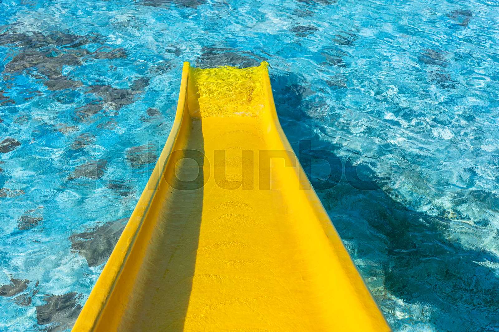 Swimming Pool Yellow Water Slide | Stock image | Colourbox