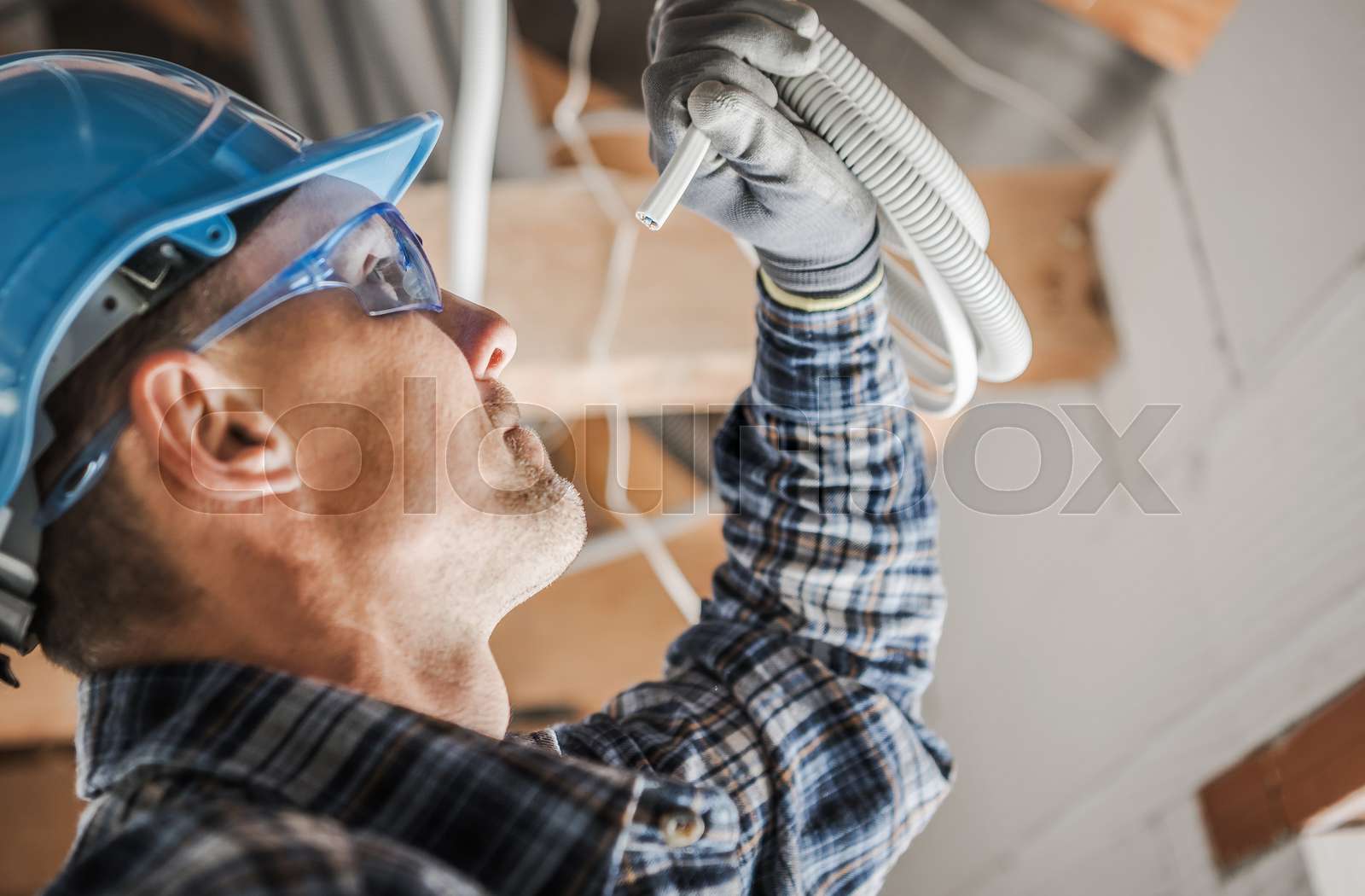 Professional Electrician Closer Look | Stock image | Colourbox