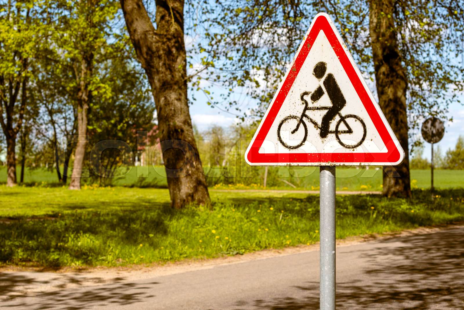 Transport warning symbol in a red triangle | Stock image | Colourbox