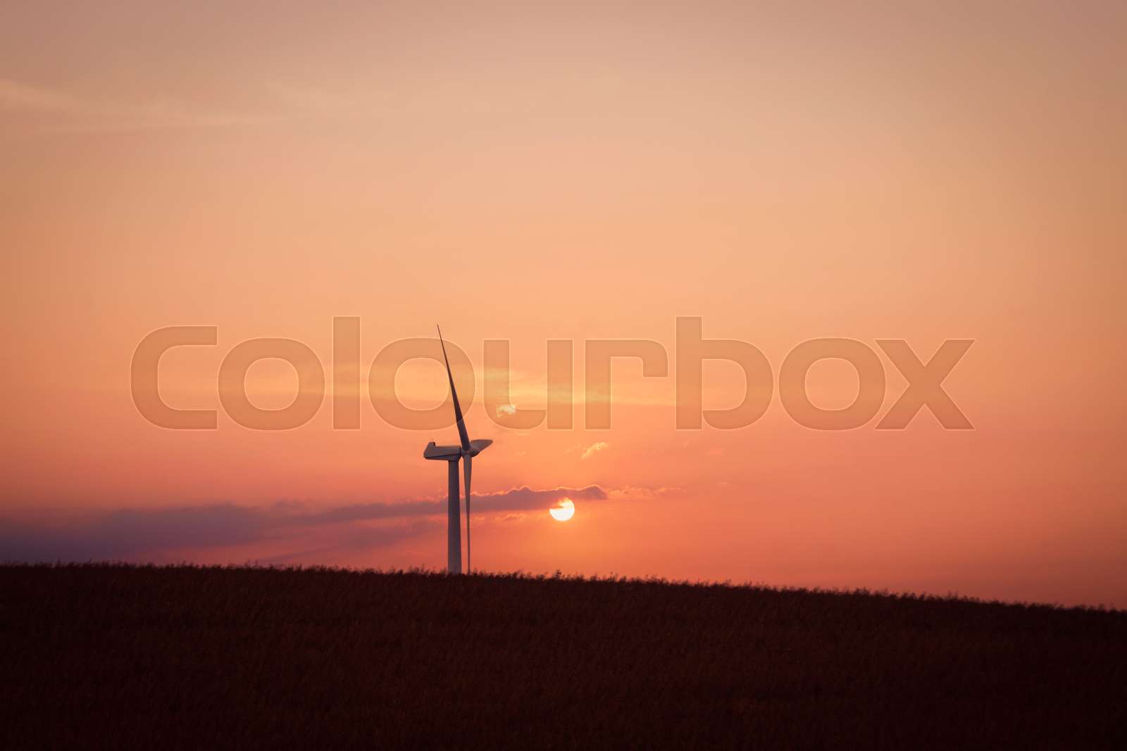 Windmill in the sunset on a hill | Stock image | Colourbox
