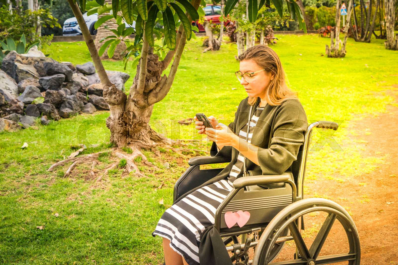 Disabled handicapped woman in wheelchair on mountain hill enjoying view ...