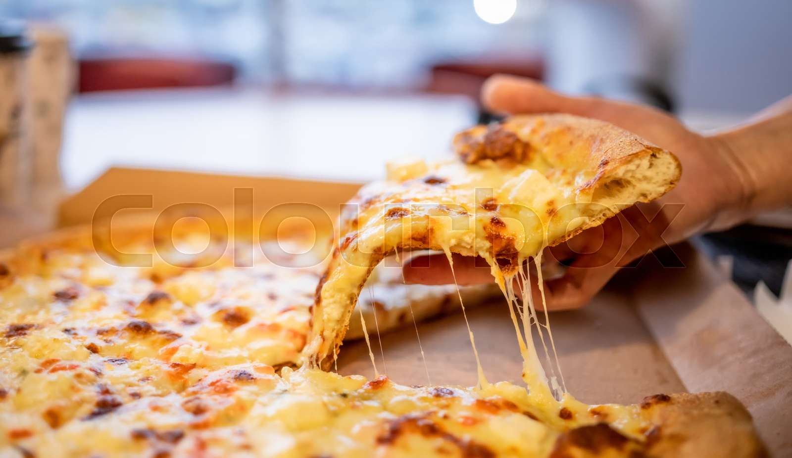 Hot pizza with cheese | Stock image | Colourbox