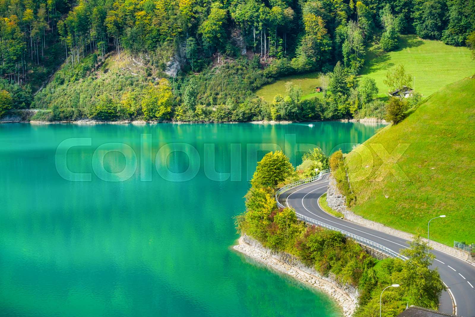 Lungern, canton of Obwalden, Switzerland. The road by the shore of the ...