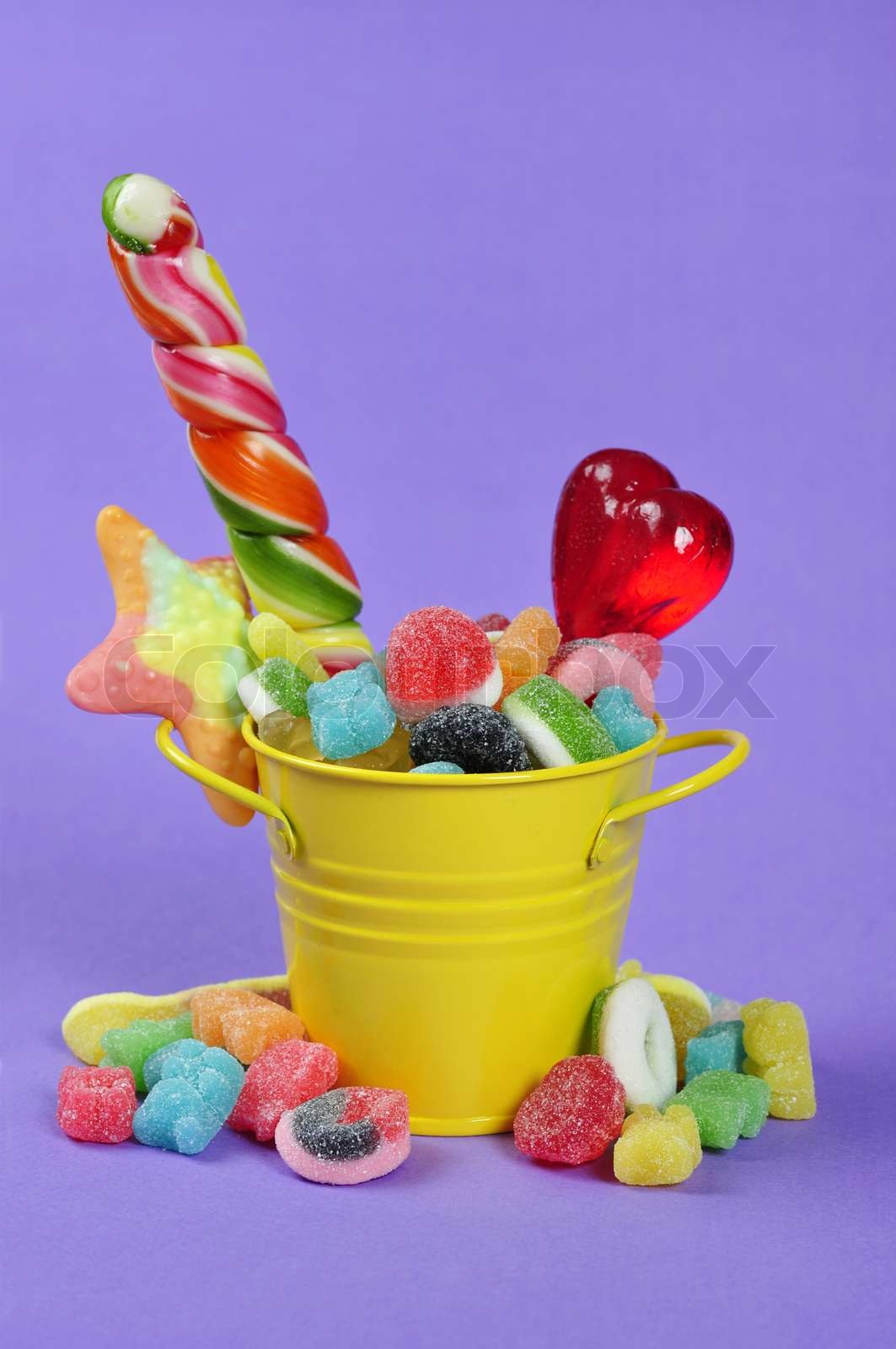 candies in yellow bucket | Stock image | Colourbox