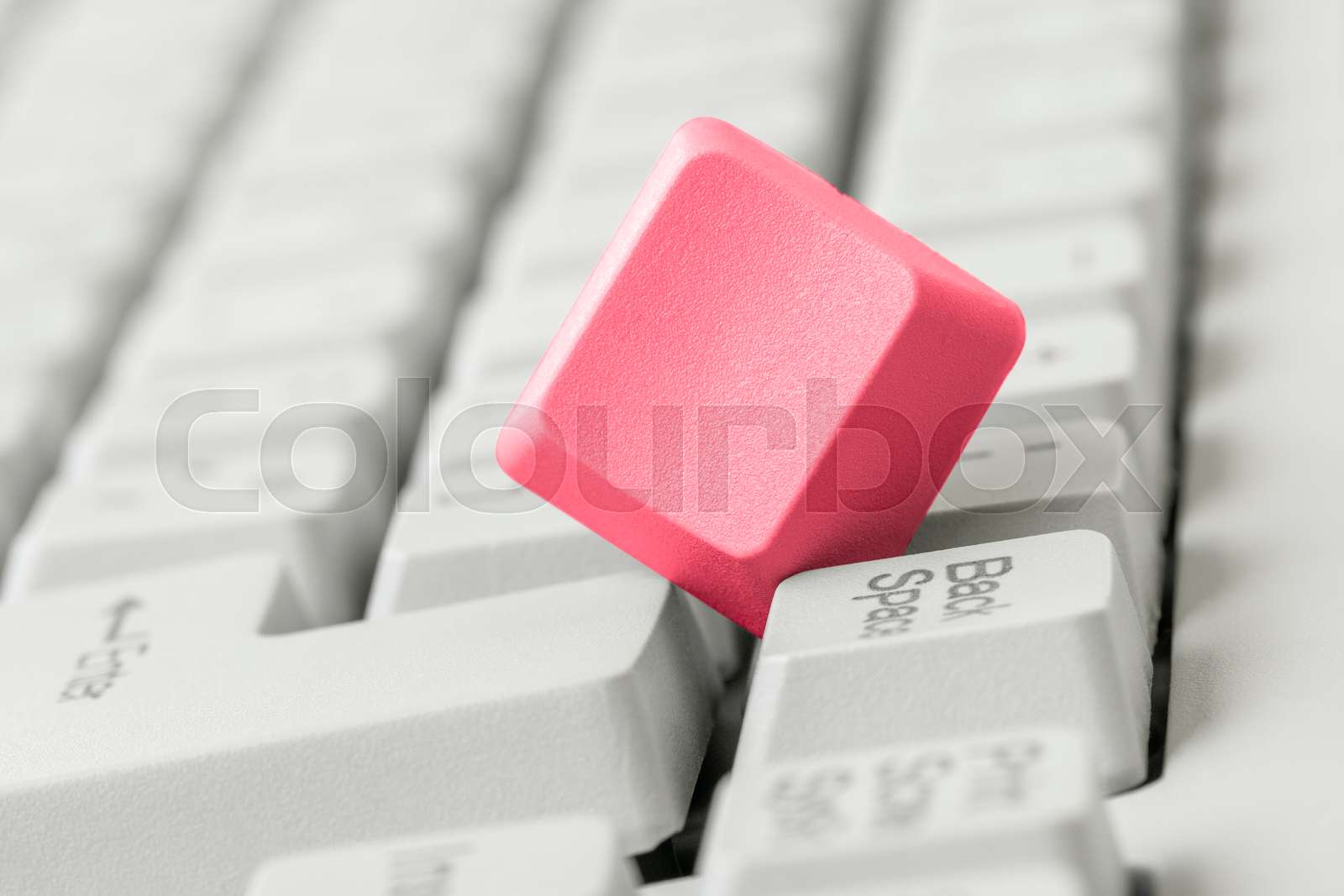 Empty red button on white computer keyboard | Stock image | Colourbox