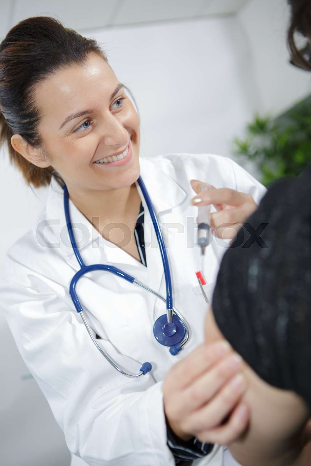 doctor are injected to the patient | Stock image | Colourbox
