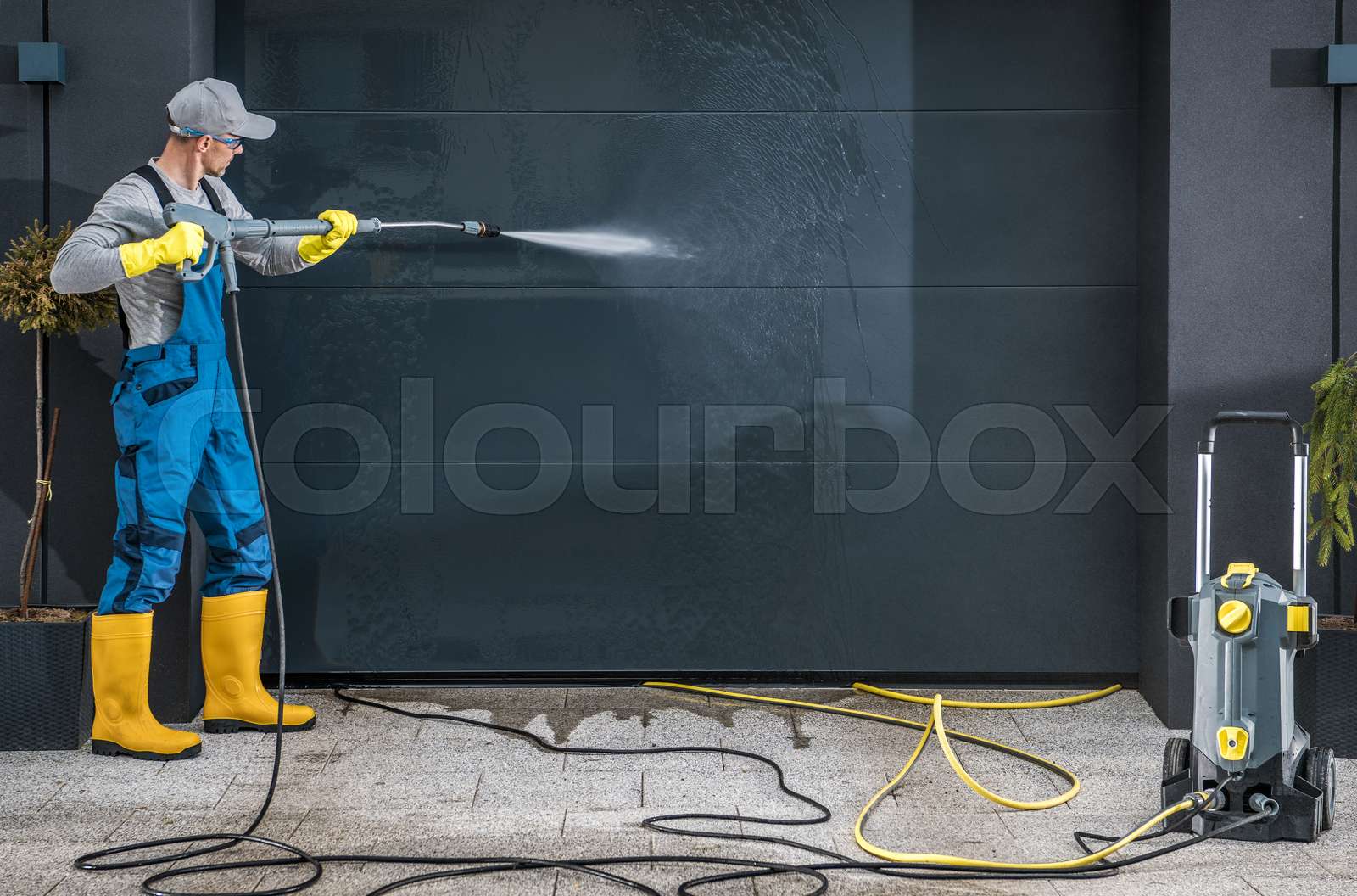 Residential Garage Doors Powerful Pressure Washing | Stock image ...