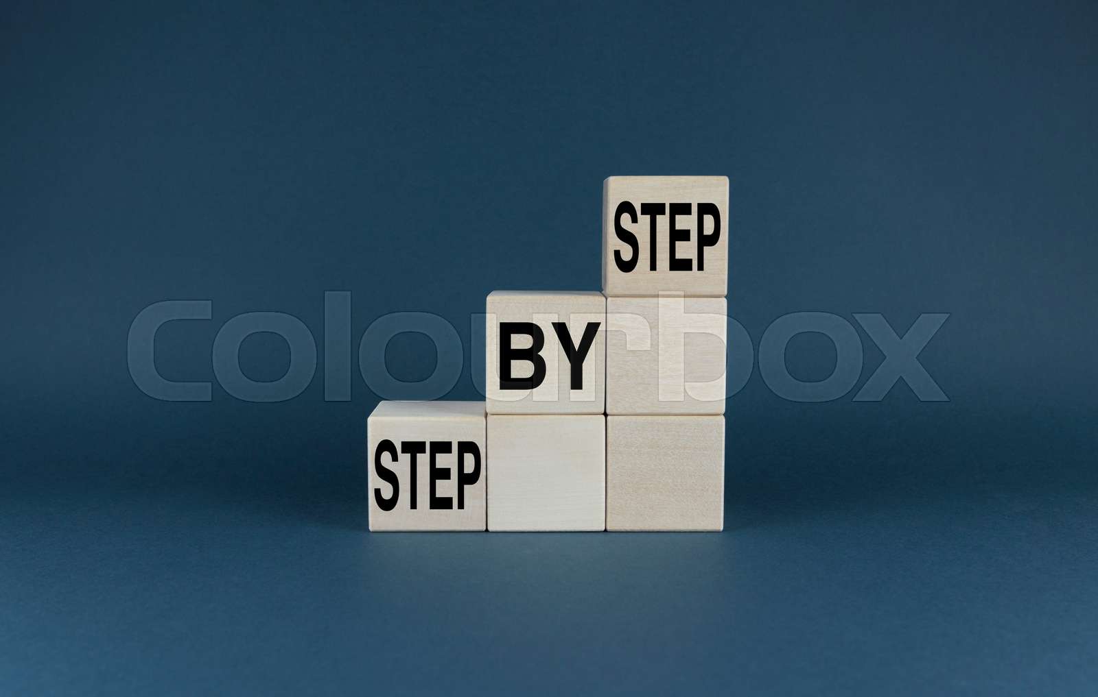 Step by step. Cubes form words Step by Step. | Stock image | Colourbox