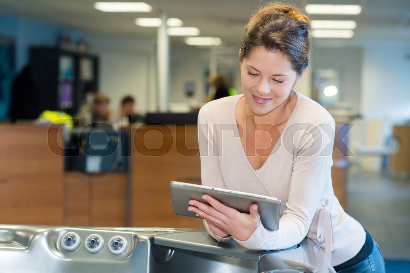 female customer using a tablet | Stock image | Colourbox