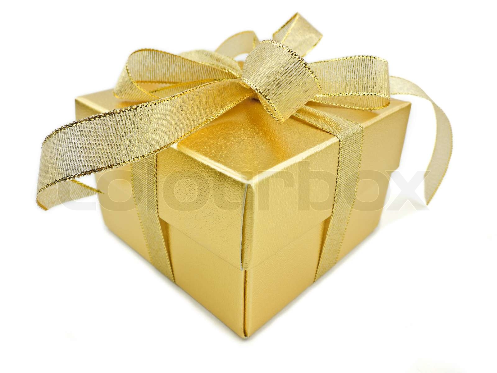 Golden gift box with golden ribbon | Stock image | Colourbox