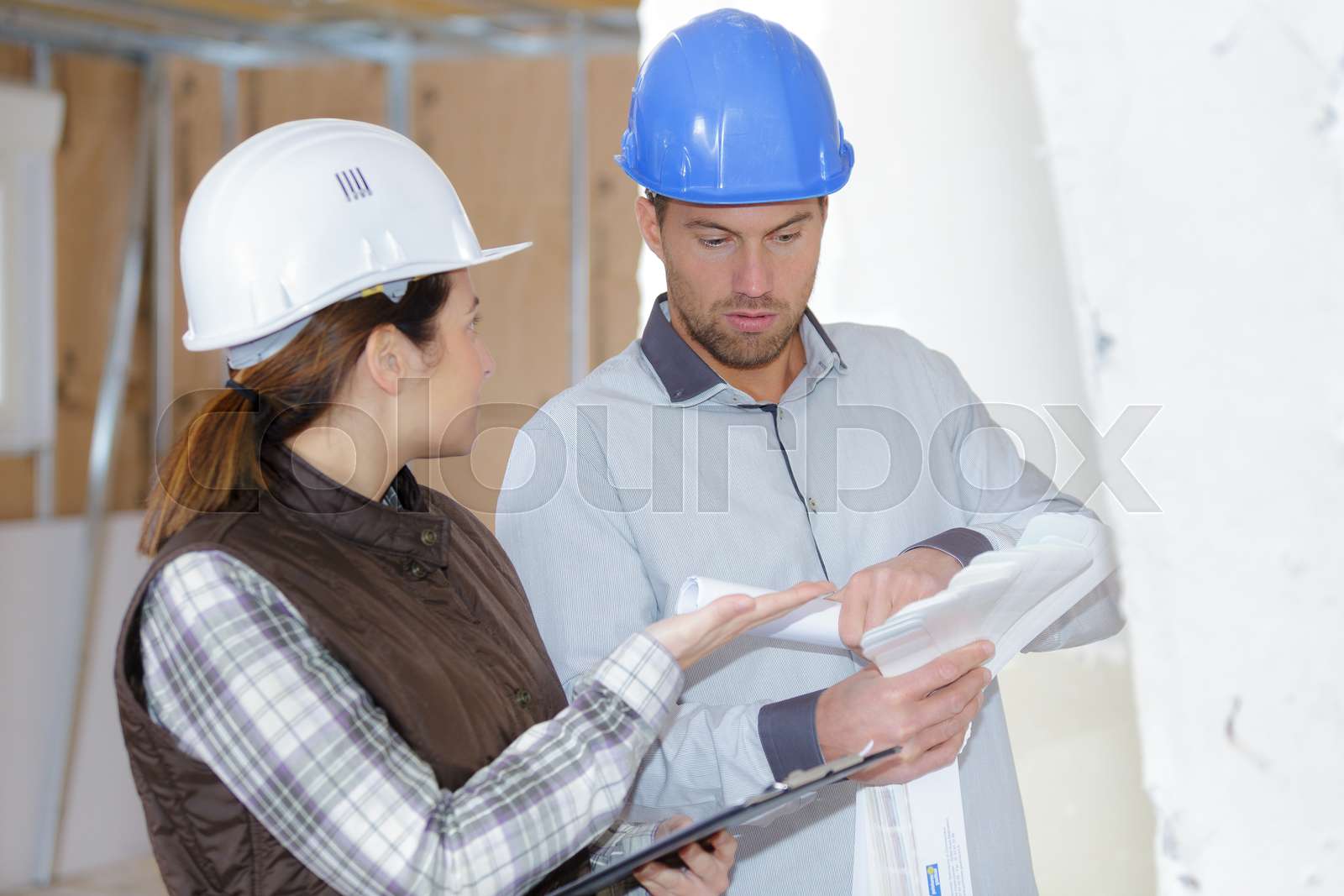 construction manager and engineer working on building site | Stock ...