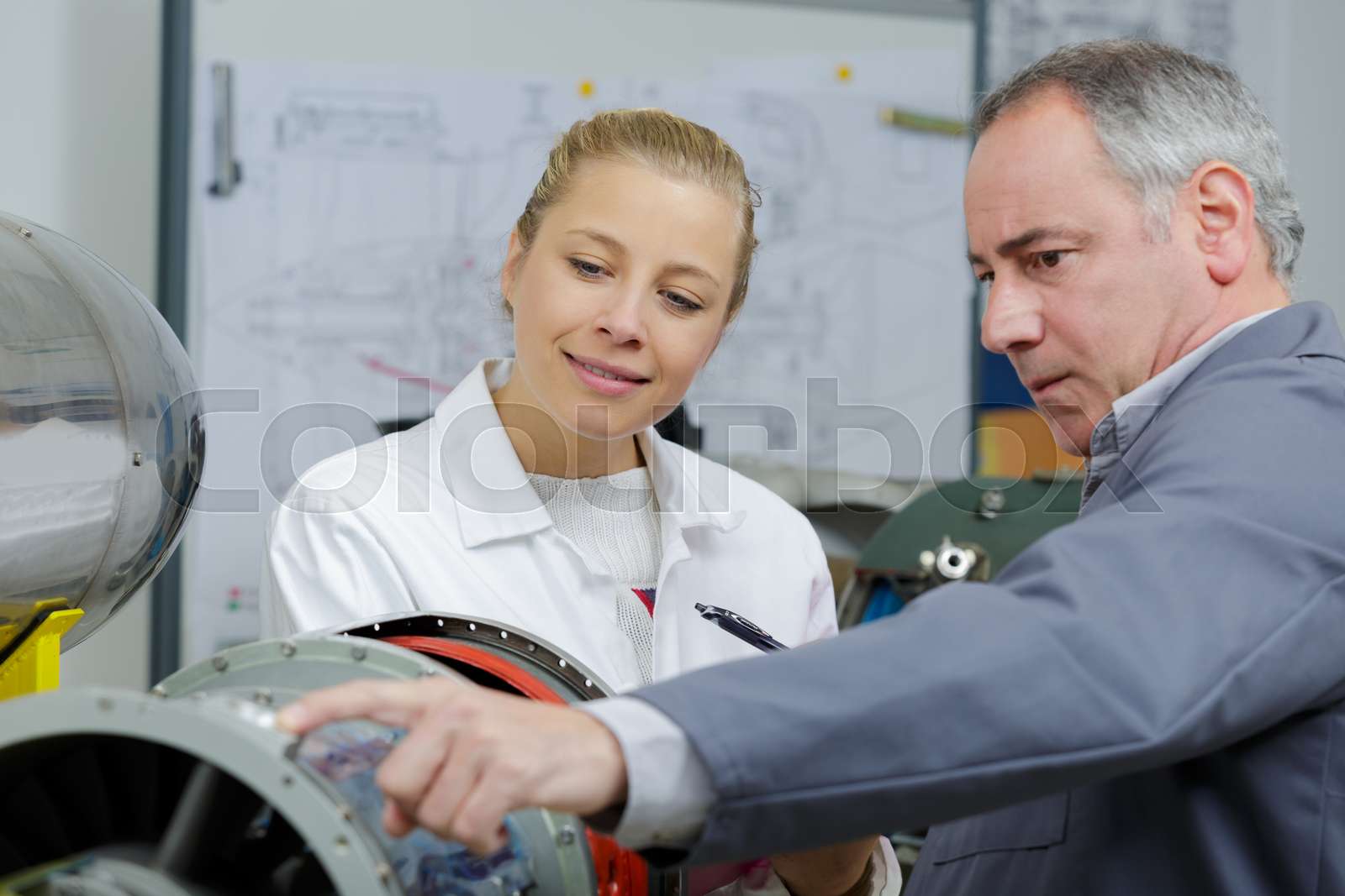 female apprentice being trained in aerospace workshop | Stock image ...