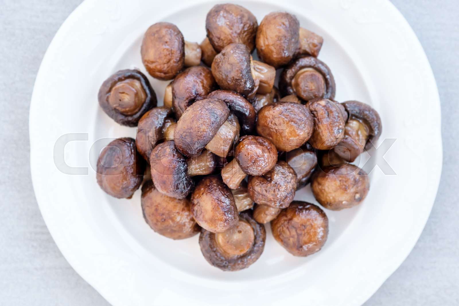 Stir-fry button mushrooms | Stock image | Colourbox