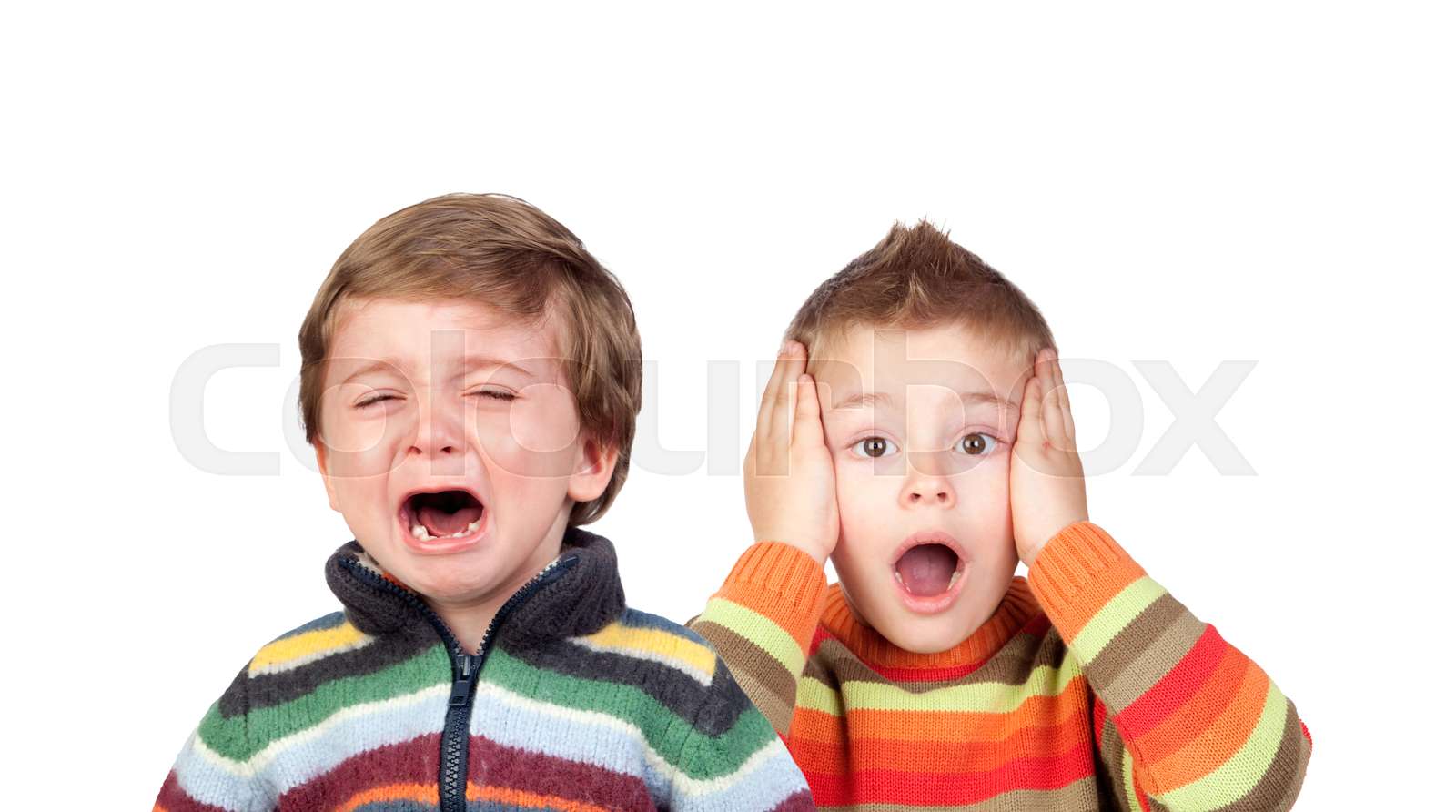 Two funny small brothers showing emotions | Stock image | Colourbox