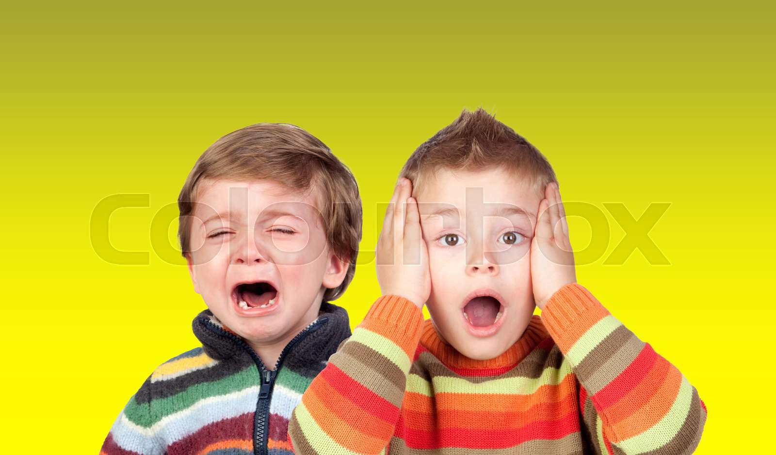 Two funny small brothers showing emotions | Stock image | Colourbox
