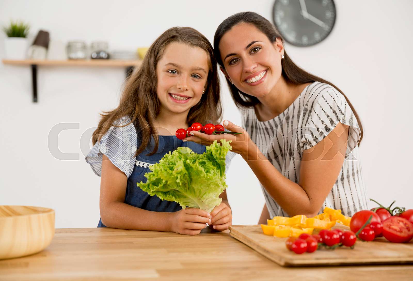 Mother and daughter cooking | Stock image | Colourbox