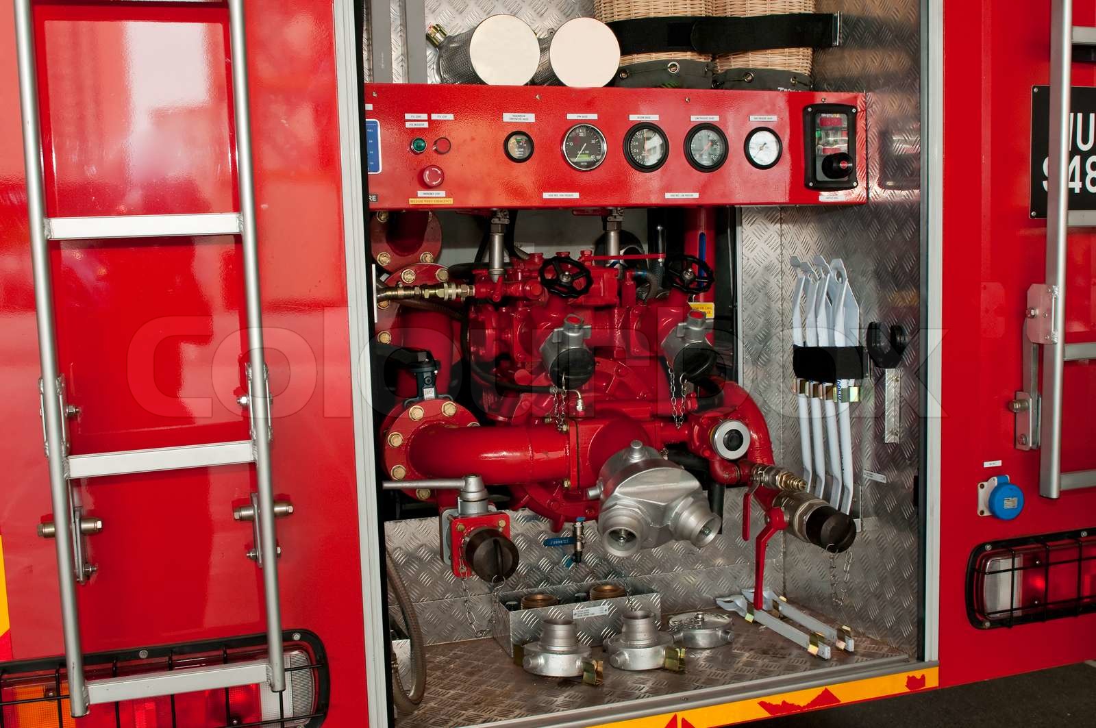water pump at the back of the fire engine | Stock image | Colourbox