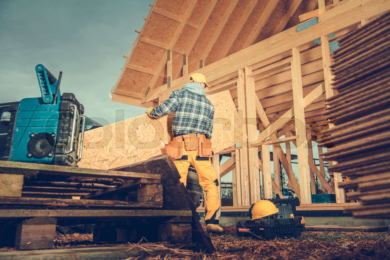 Contractor Moving Construction Elements | Stock image | Colourbox