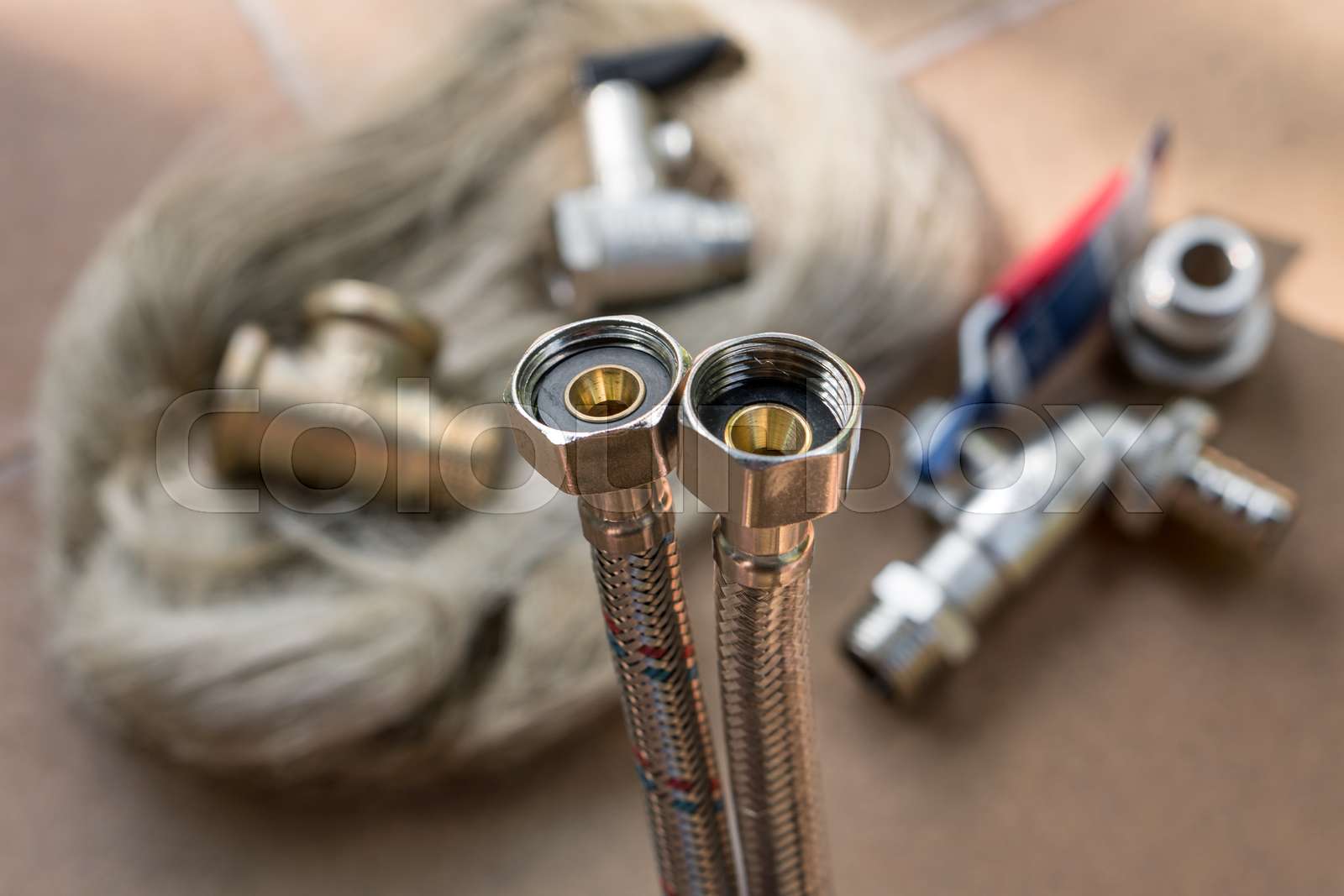 New plumbing water hoses pipes. | Stock image | Colourbox