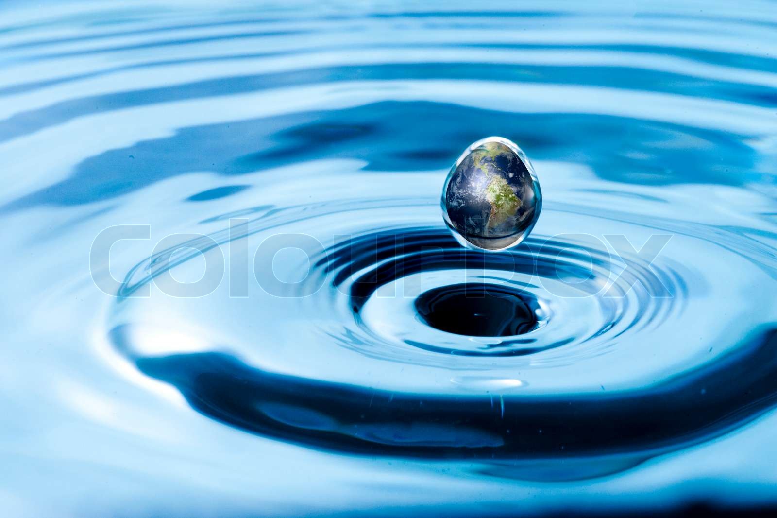globe inside water droplet | Stock image | Colourbox