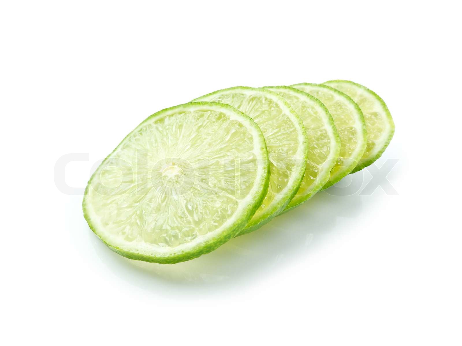 Lime Zitrone Scheibe auf weißem Hintergrund | Stock Bild | Colourbox