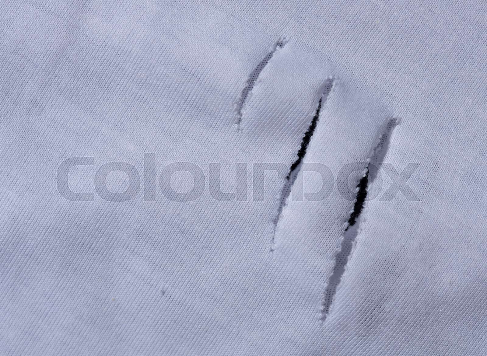 Clothes torn due to decay of the fabric,fabric damage | Stock image ...