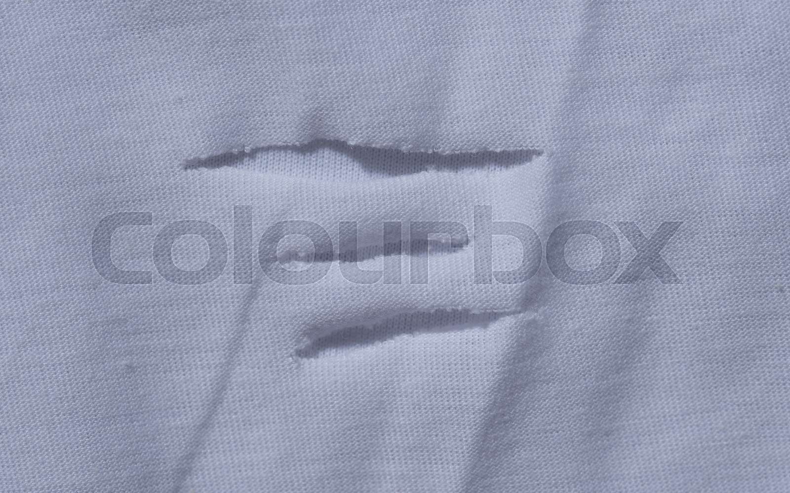 Clothes torn due to decay of the fabric,fabric damage | Stock image ...