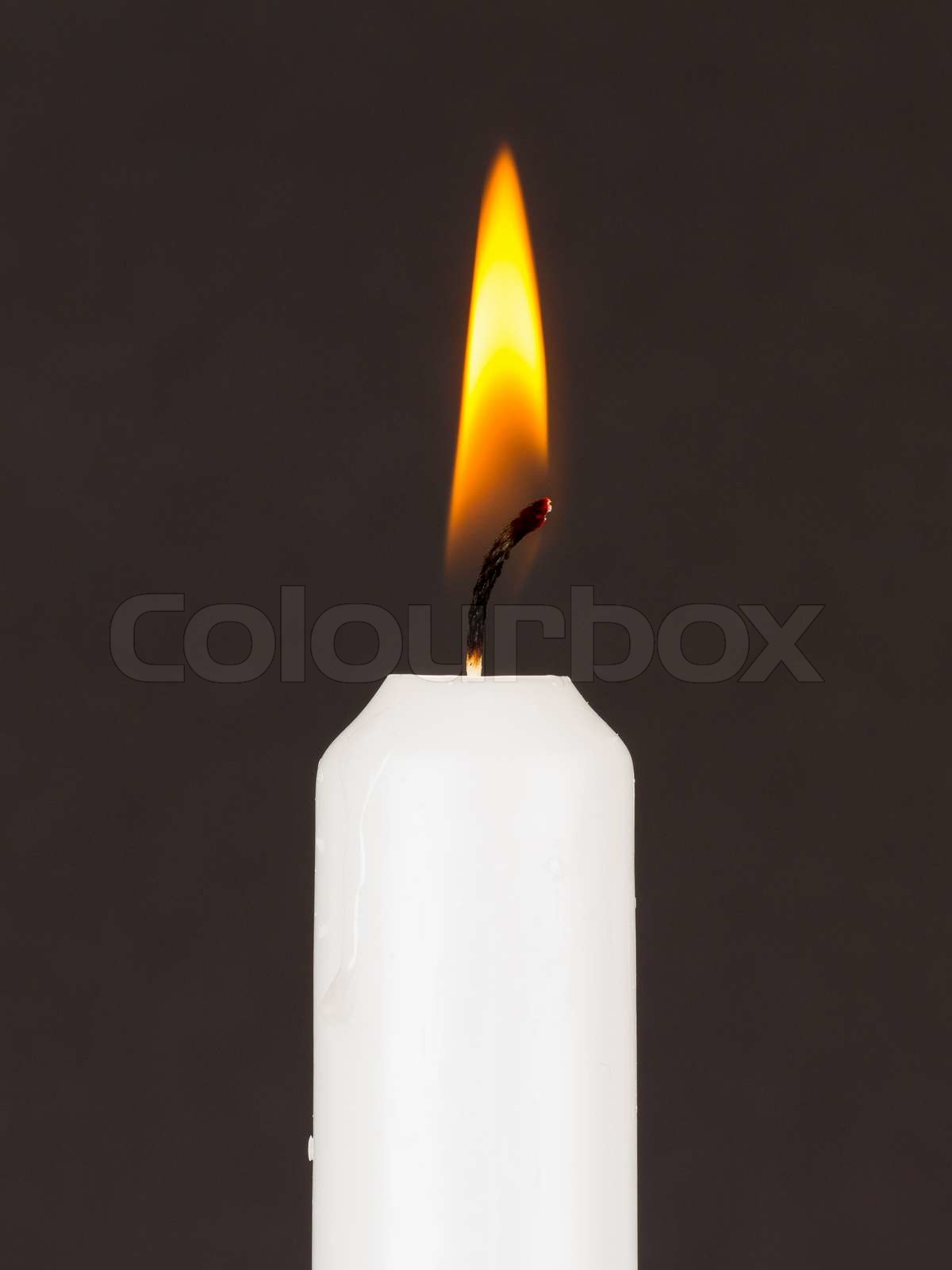 White candle isolated | Stock image | Colourbox