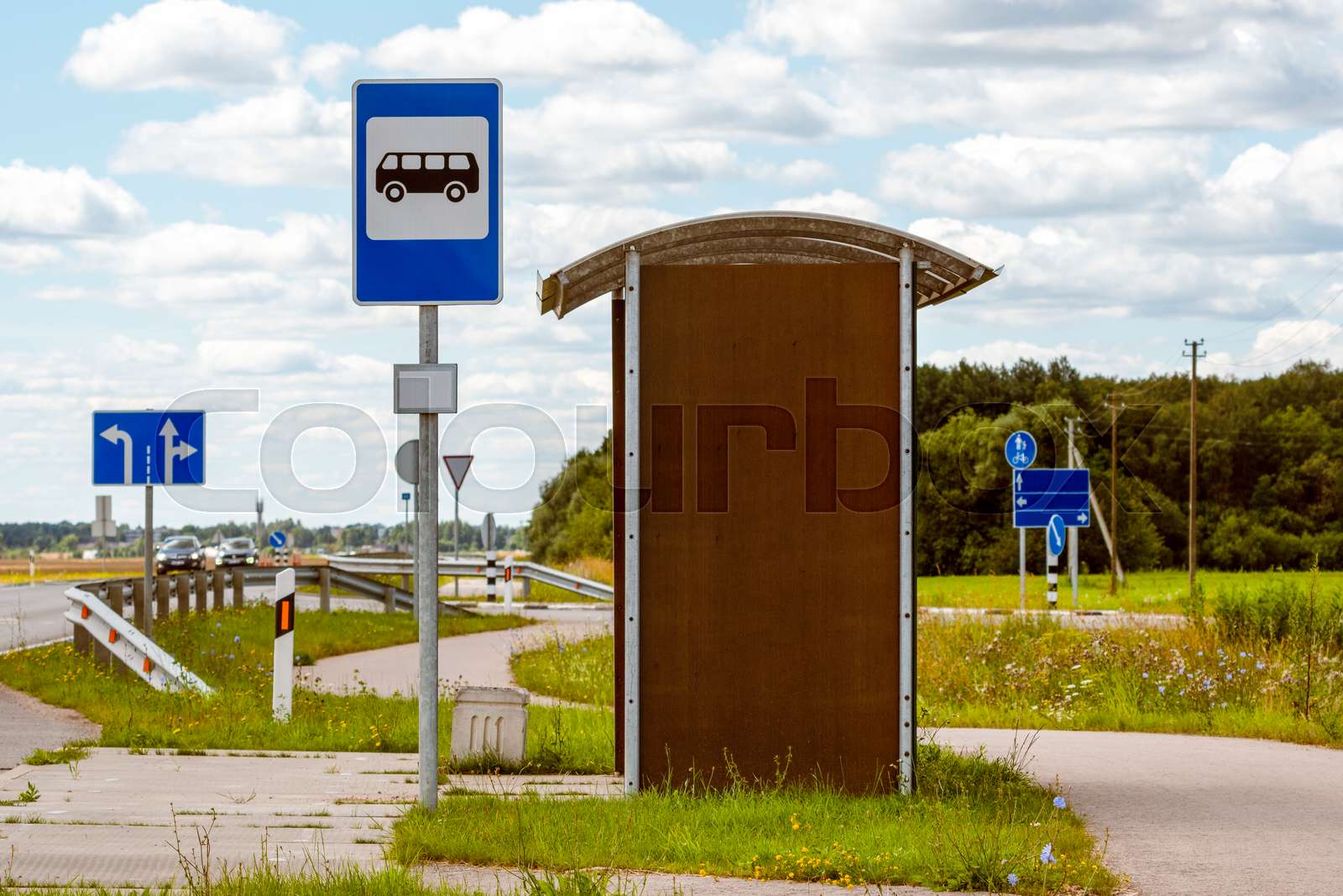 Empty bus stop in the countryside on a sunny summer day | Stock image ...