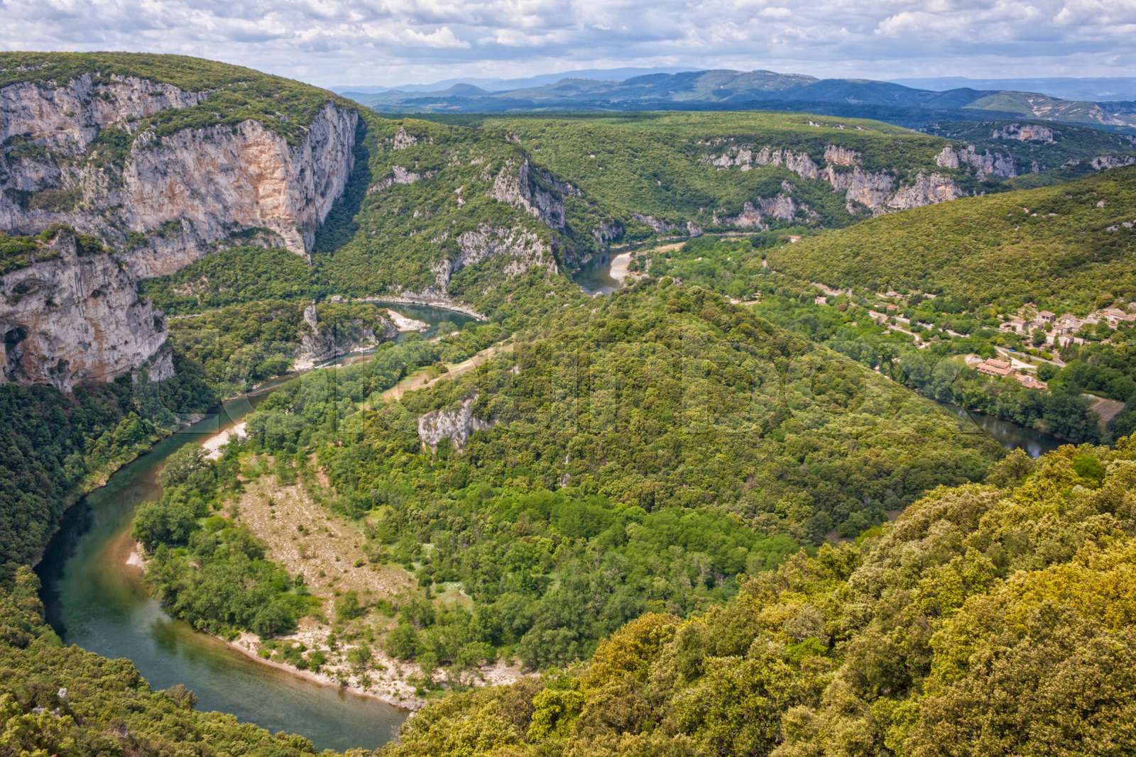 River bend of the Ardèche near Vallon-Pont-d'Arc | Stock image | Colourbox