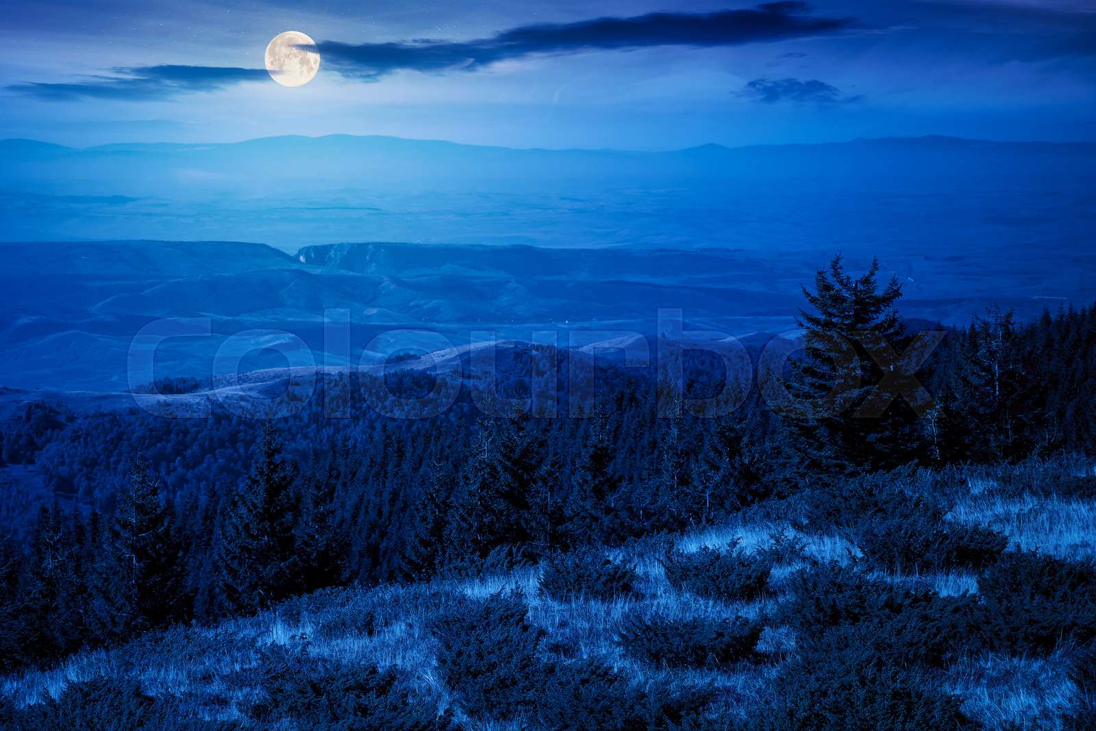 mountain landscape with forested hill at night. arieseni mountains of ...