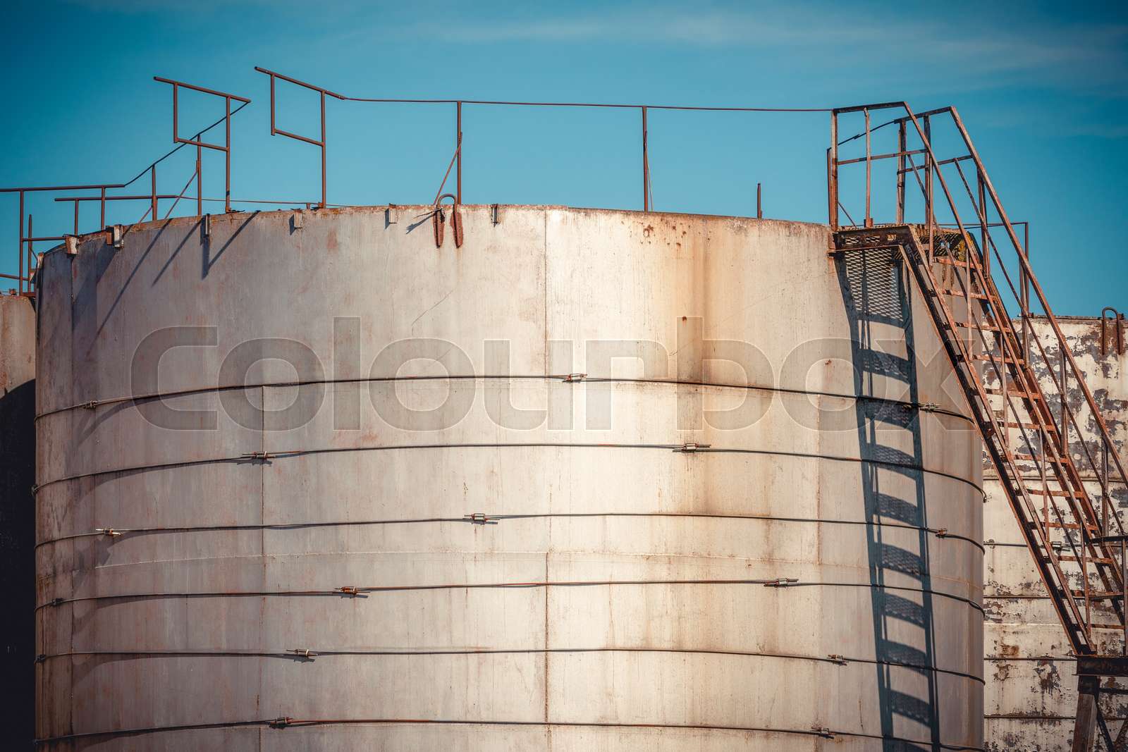 Close up of a large tanks at cargo terminal | Stock image | Colourbox