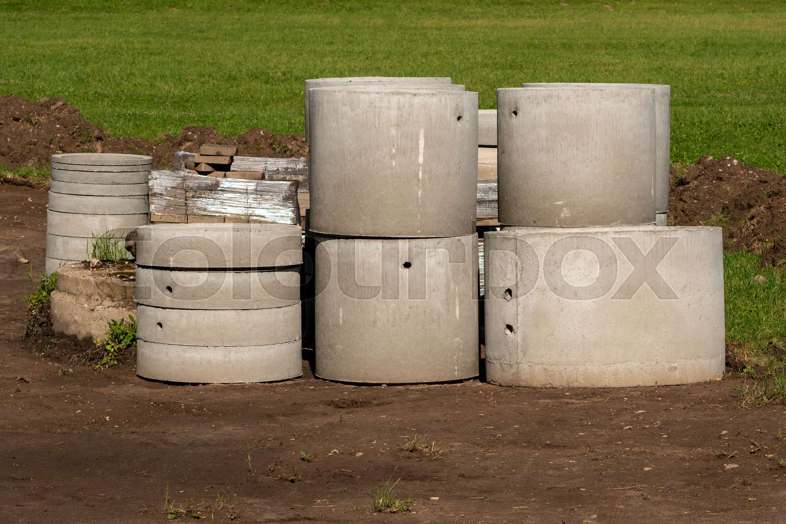 Reinforced concrete rings for the well and sewer | Stock image | Colourbox