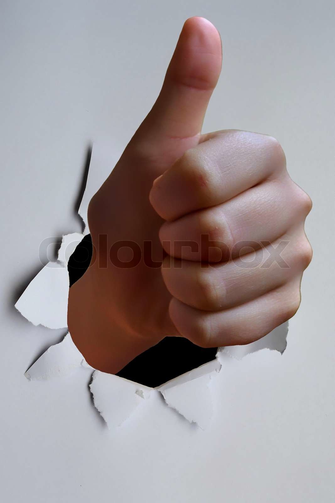 Eine Hand mit erhobenem Daumen | Stock Bild | Colourbox