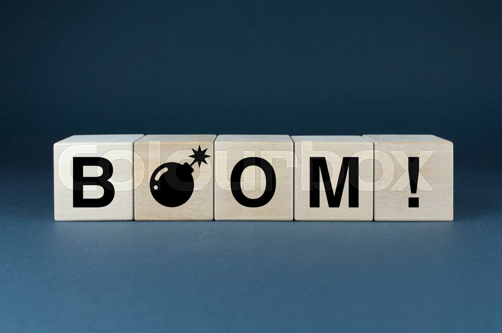 Cubes form the word Boom. An extensive concept of the word Boom ranging ...