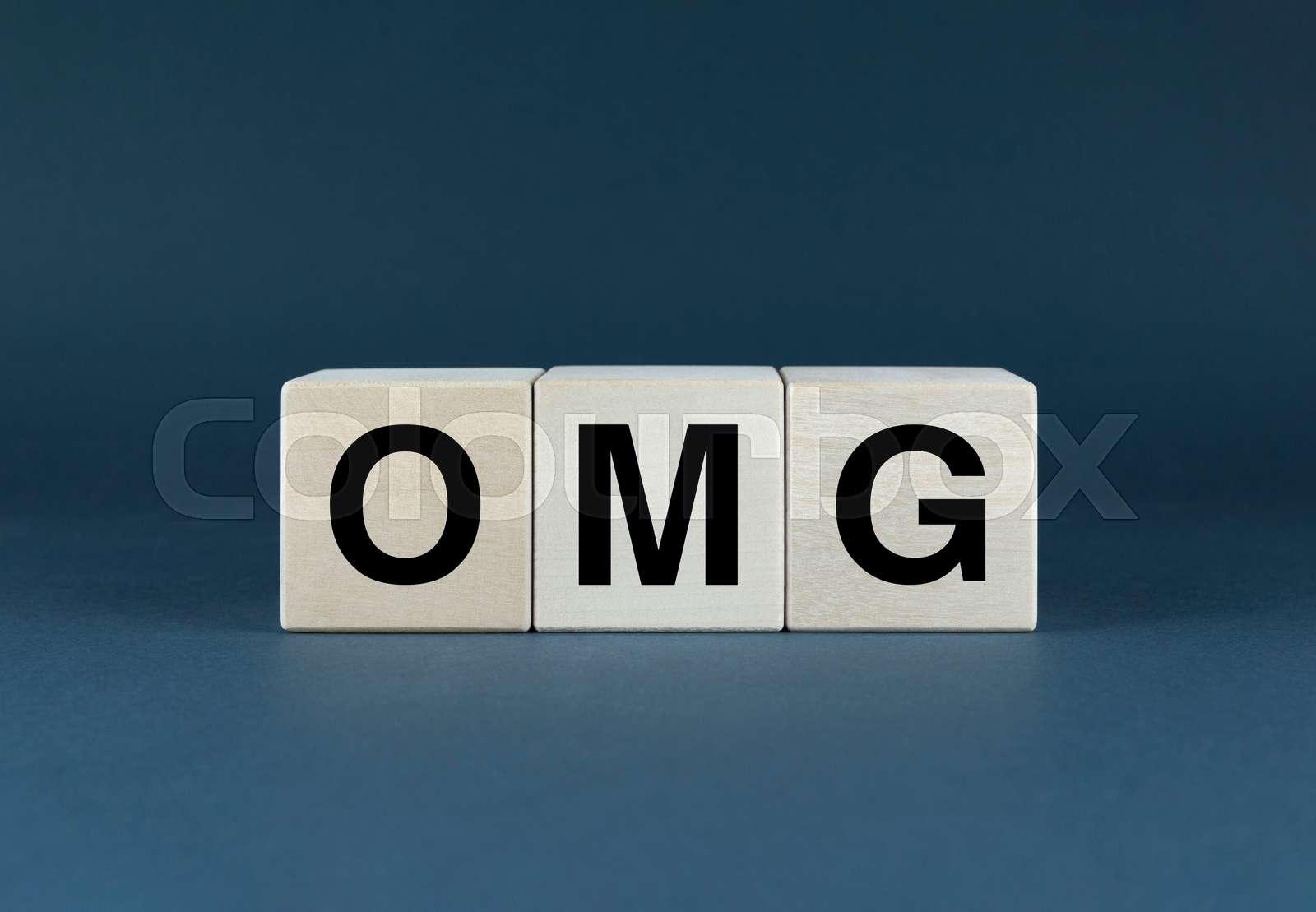 Omg. Cubes form the word OMG. Concept of the word OMG - Oh My God ...