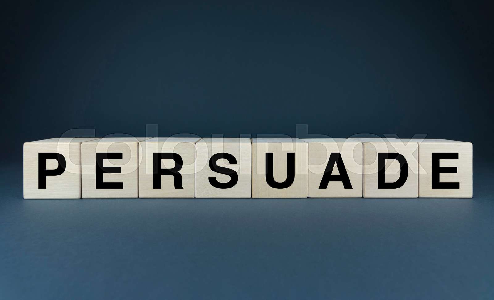Persuade. The cubes form the word Persuade. | Stock image | Colourbox