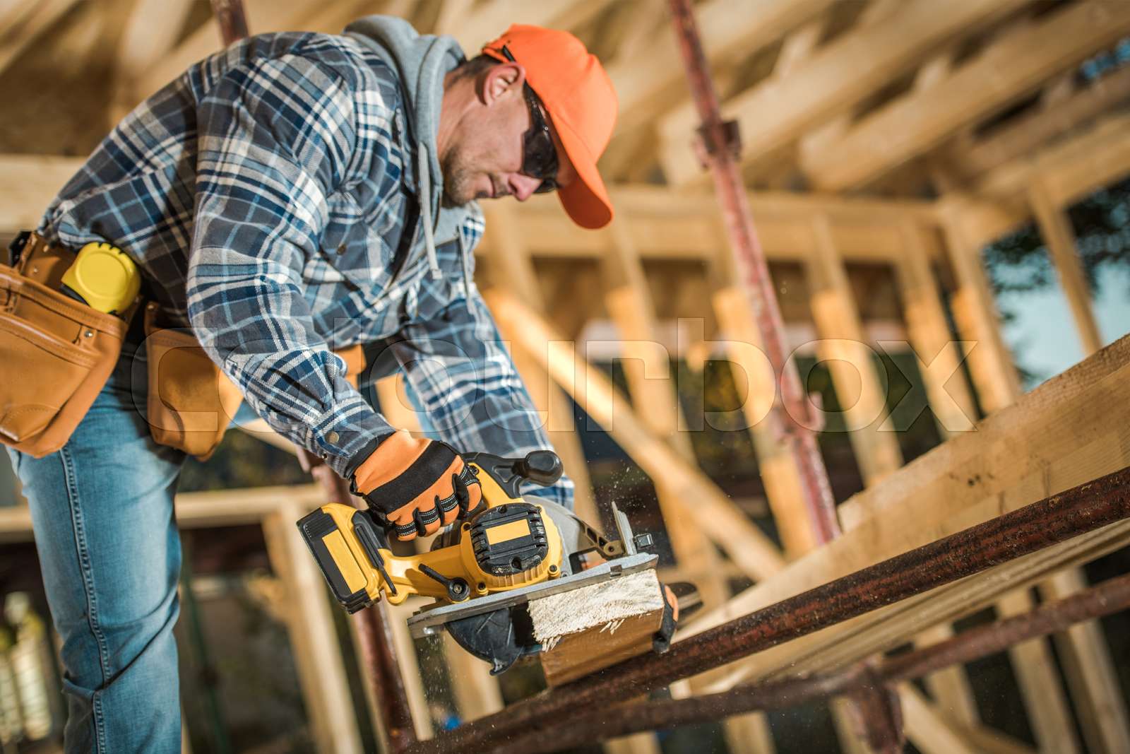 Carpenter Planing Wood Plank at the Construction Site | Stock image ...