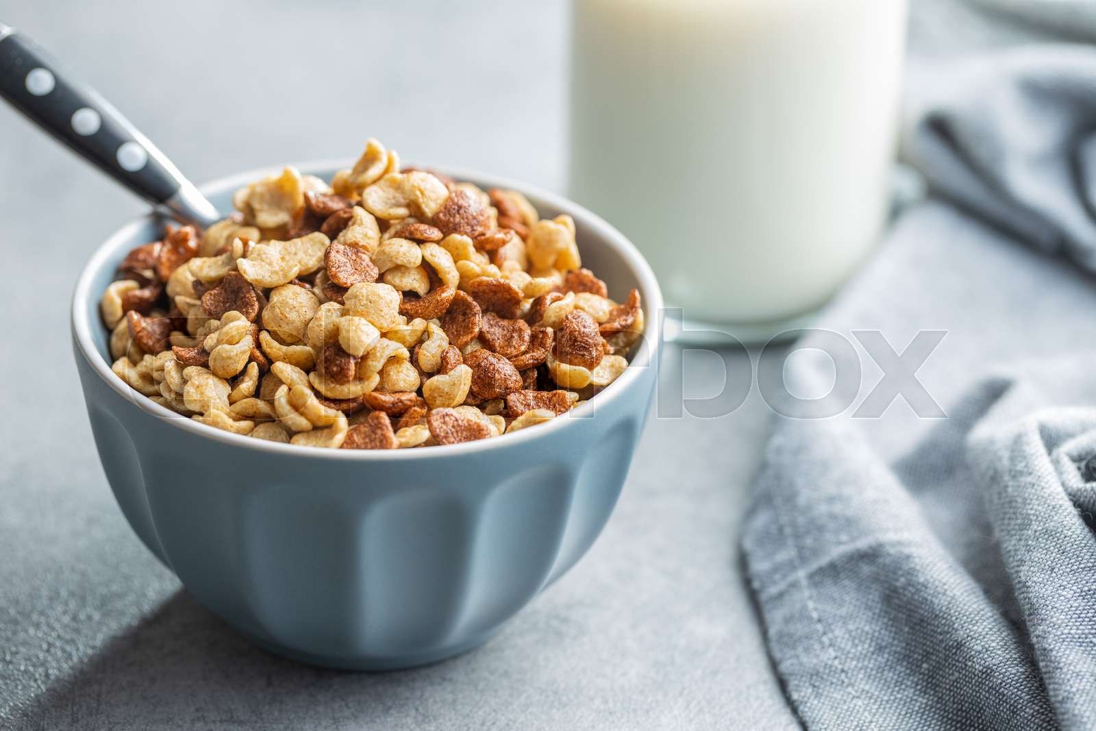 Breakfast cereal flakes in bowl. | Stock image | Colourbox
