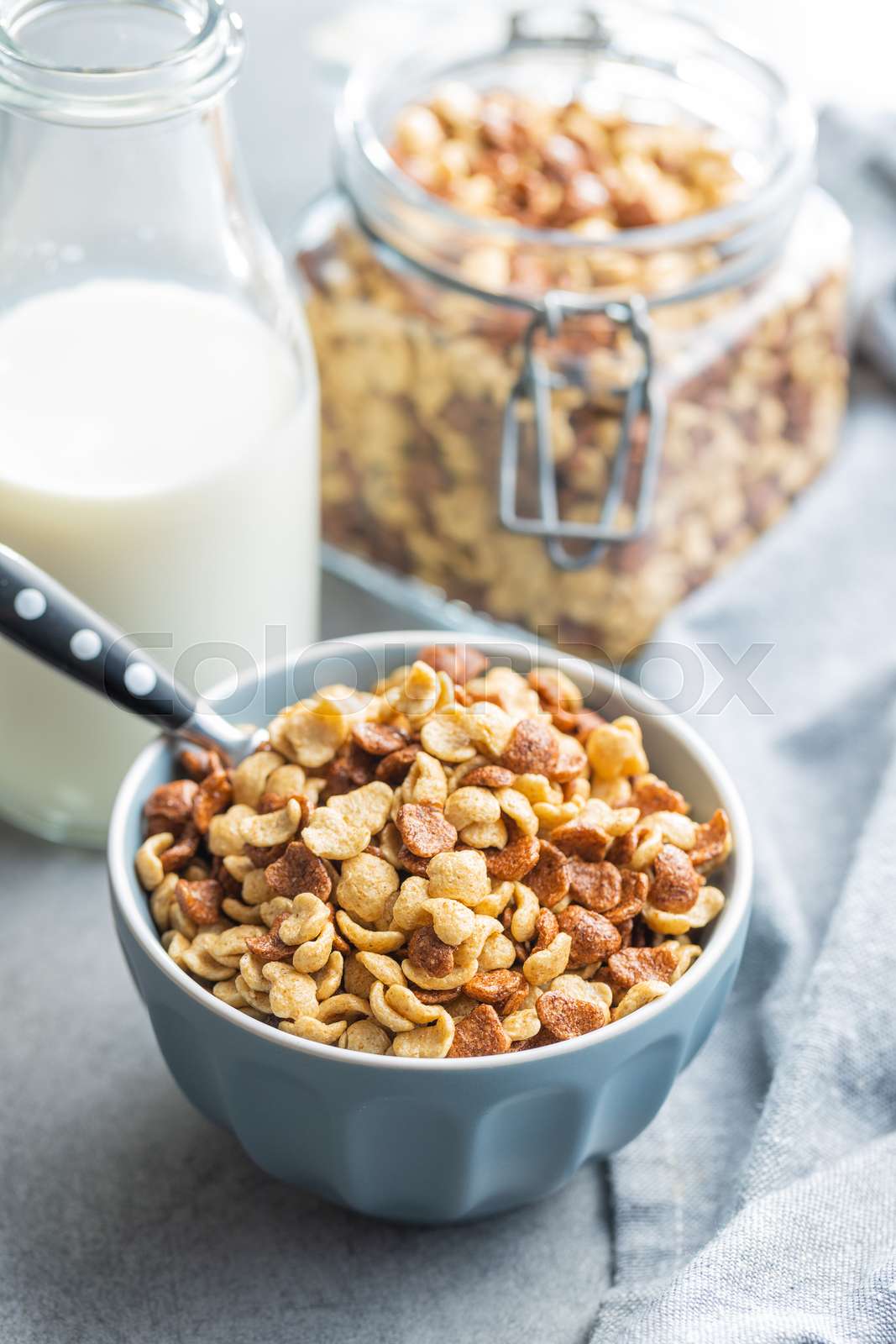 Breakfast cereal flakes in bowl. | Stock image | Colourbox