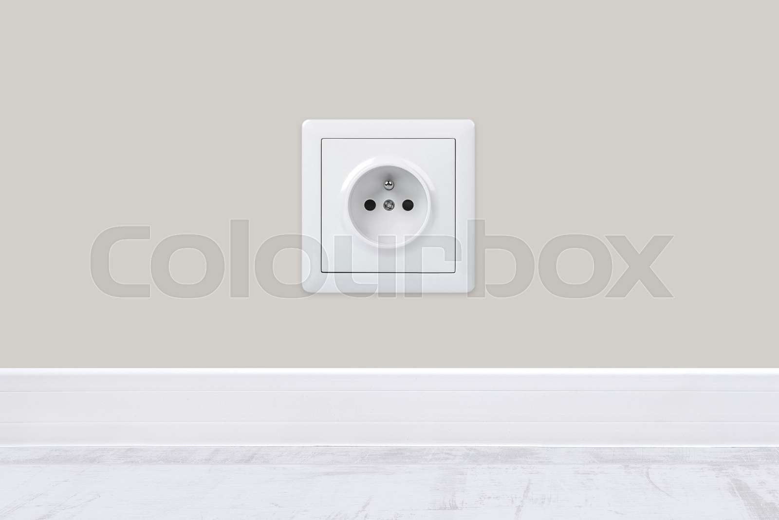 White power outlet isolated in wall | Stock image | Colourbox