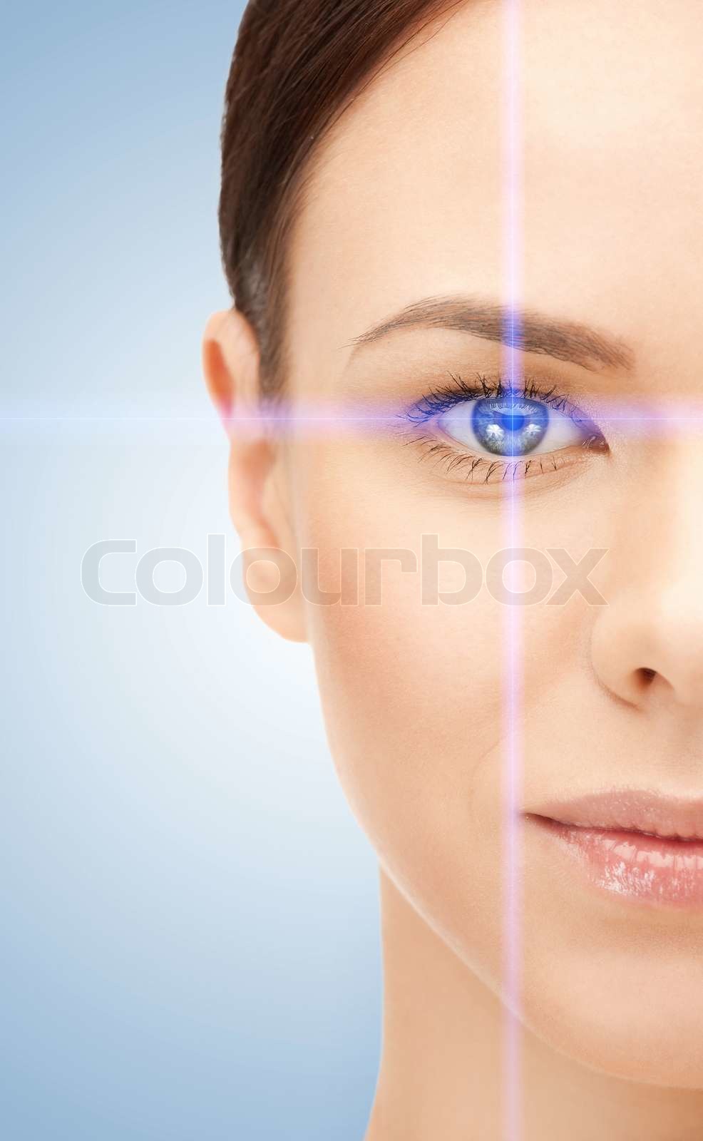 beautiful woman pointing to eye | Stock image | Colourbox