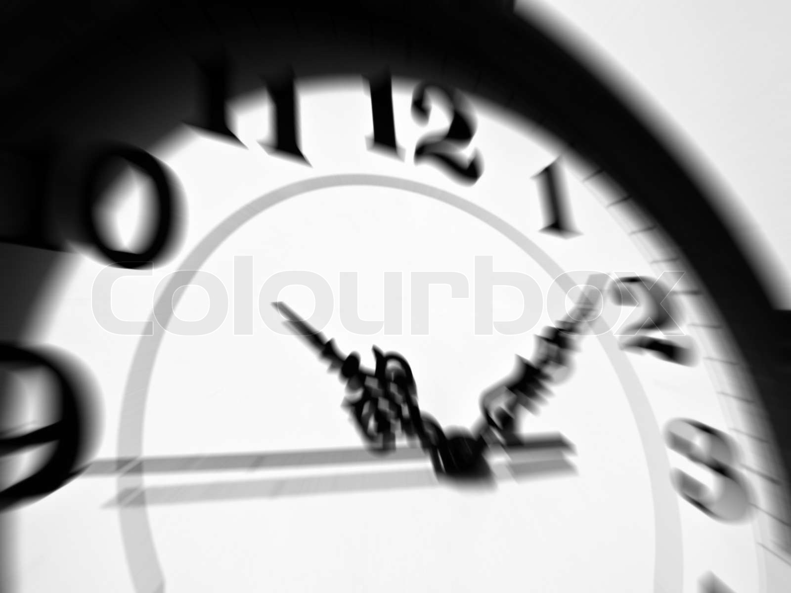 Blur clock macro | Stock image | Colourbox