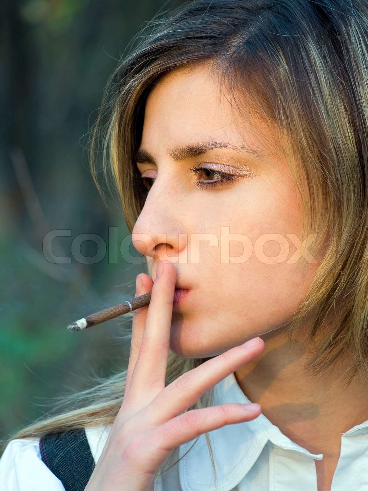 smoking girl | Stock Bild | Colourbox