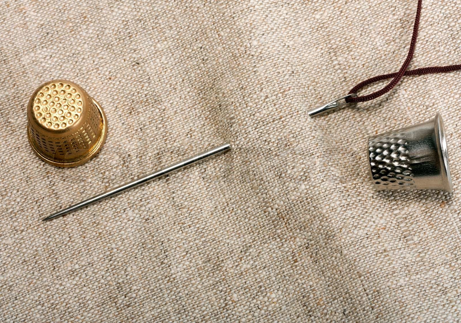 needle and thimble | Stock image | Colourbox