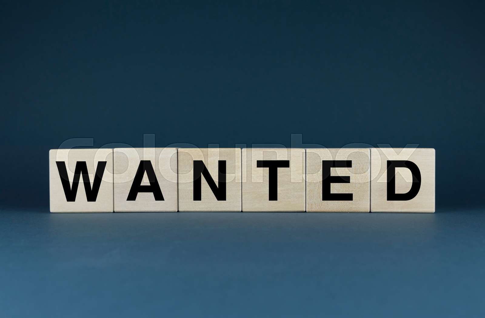 Wanted. Cubes form the word Wanted | Stock image | Colourbox