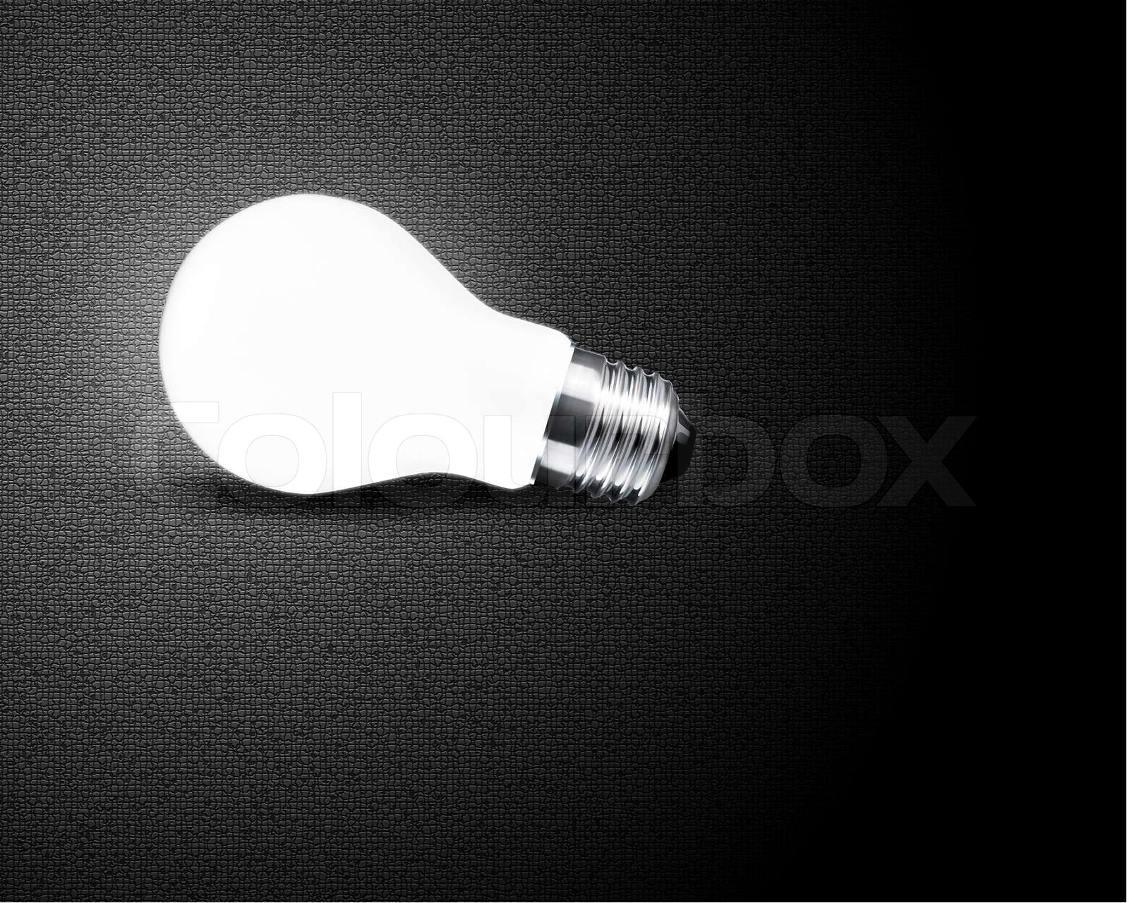 one glowing Light bulb | Stock image | Colourbox