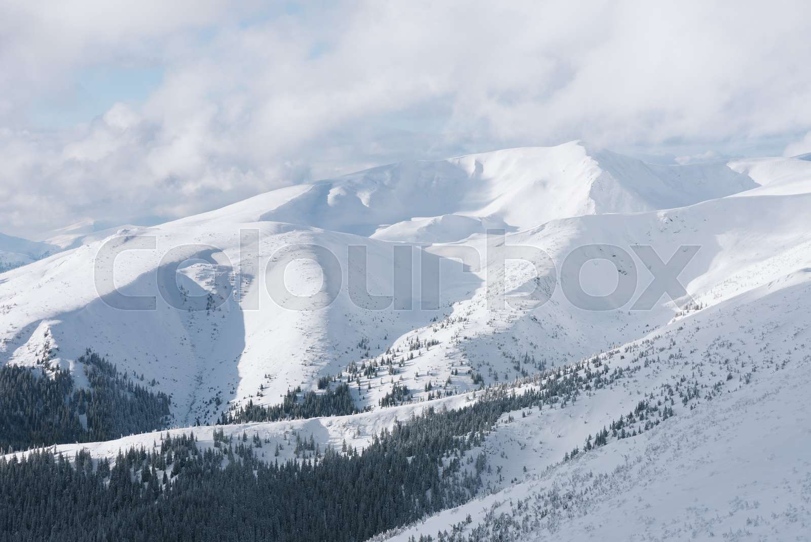Snow covered mountain ranges | Stock image | Colourbox